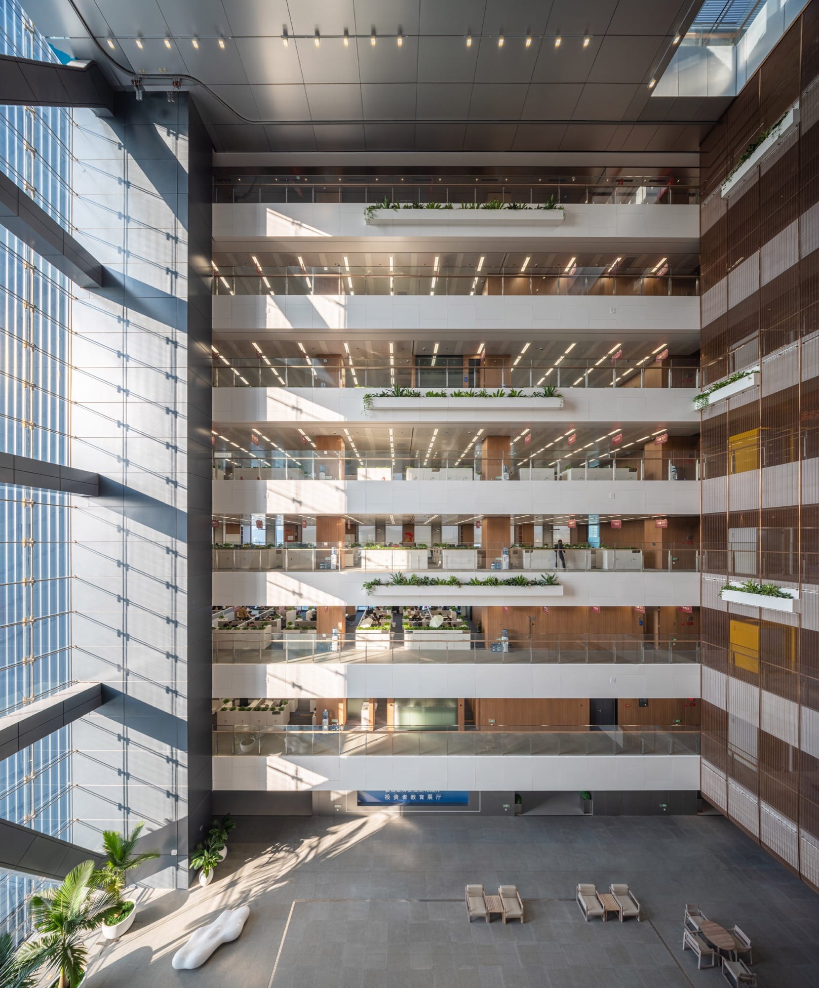 Rocco Design Architects' new Shenzhen tower features a seven-level ...