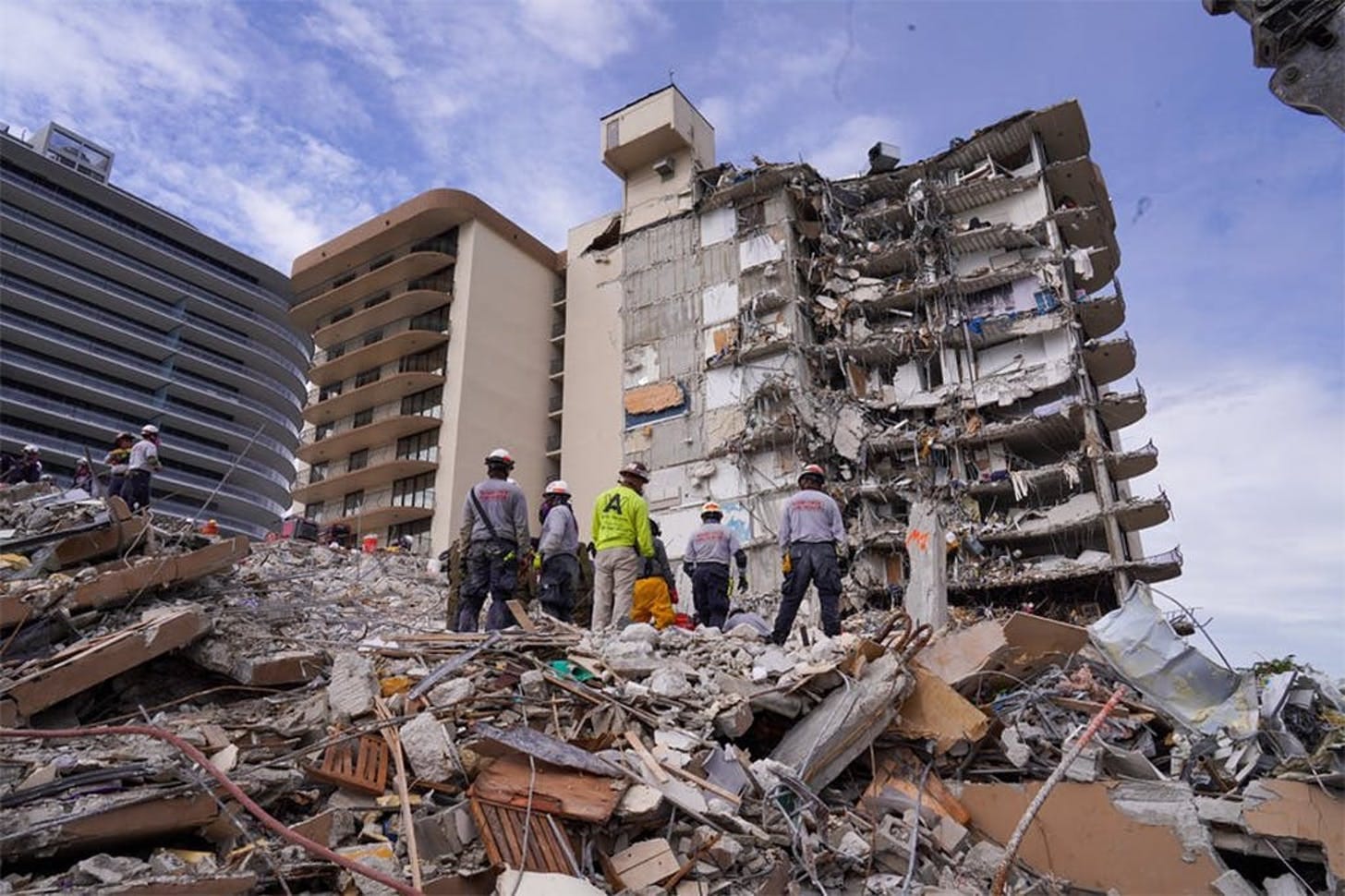 Several groups call for higher building safety standards after Surfside ...