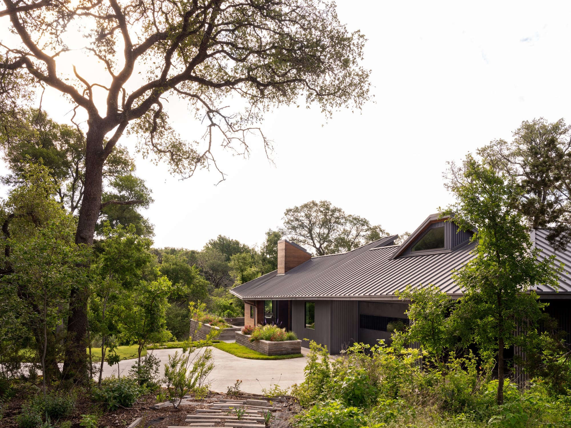 Murray Legge completes sustainable courtyard home that plays on Texas ...