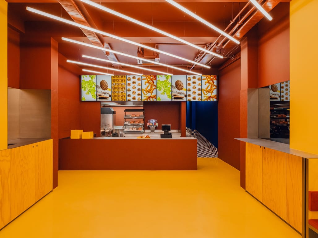 Inside a colorful Berlin burger restaurant with a ‘vibrant ...