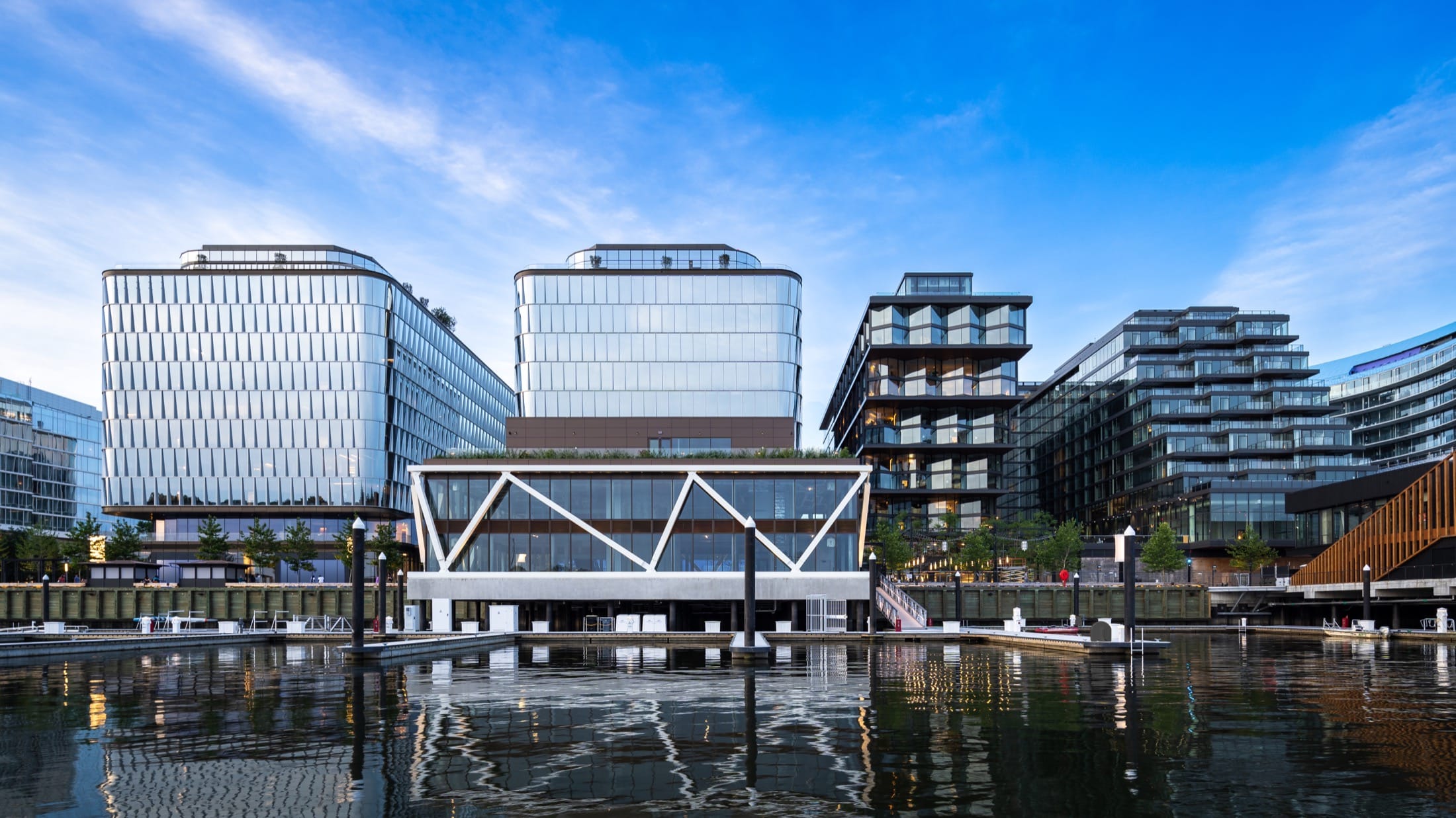 ‘Evocative’ truss wraps HWKN’s completed waterfront building in ...