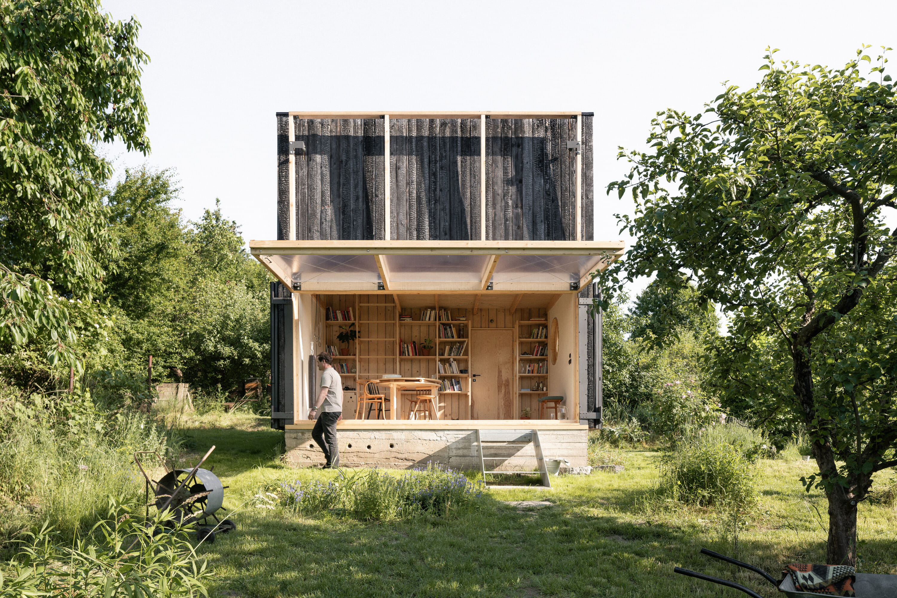 Inside a Prague pavilion with a folding timber facade by BYRÓ ...