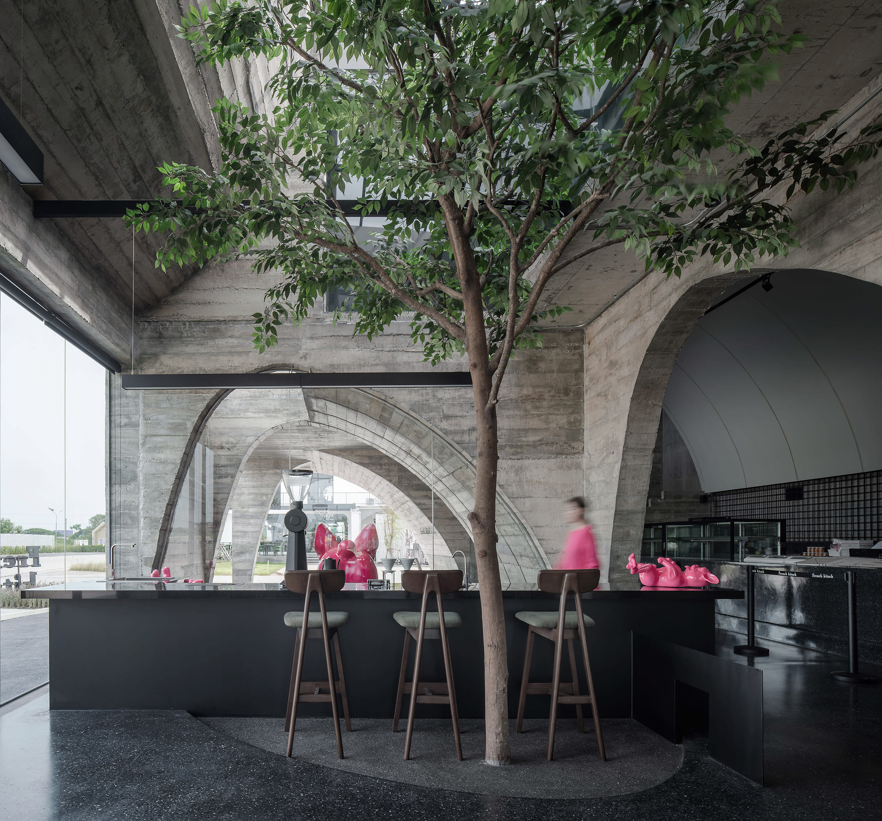 Coffee, concrete & bulldogs: Look inside this cavernous new café space ...
