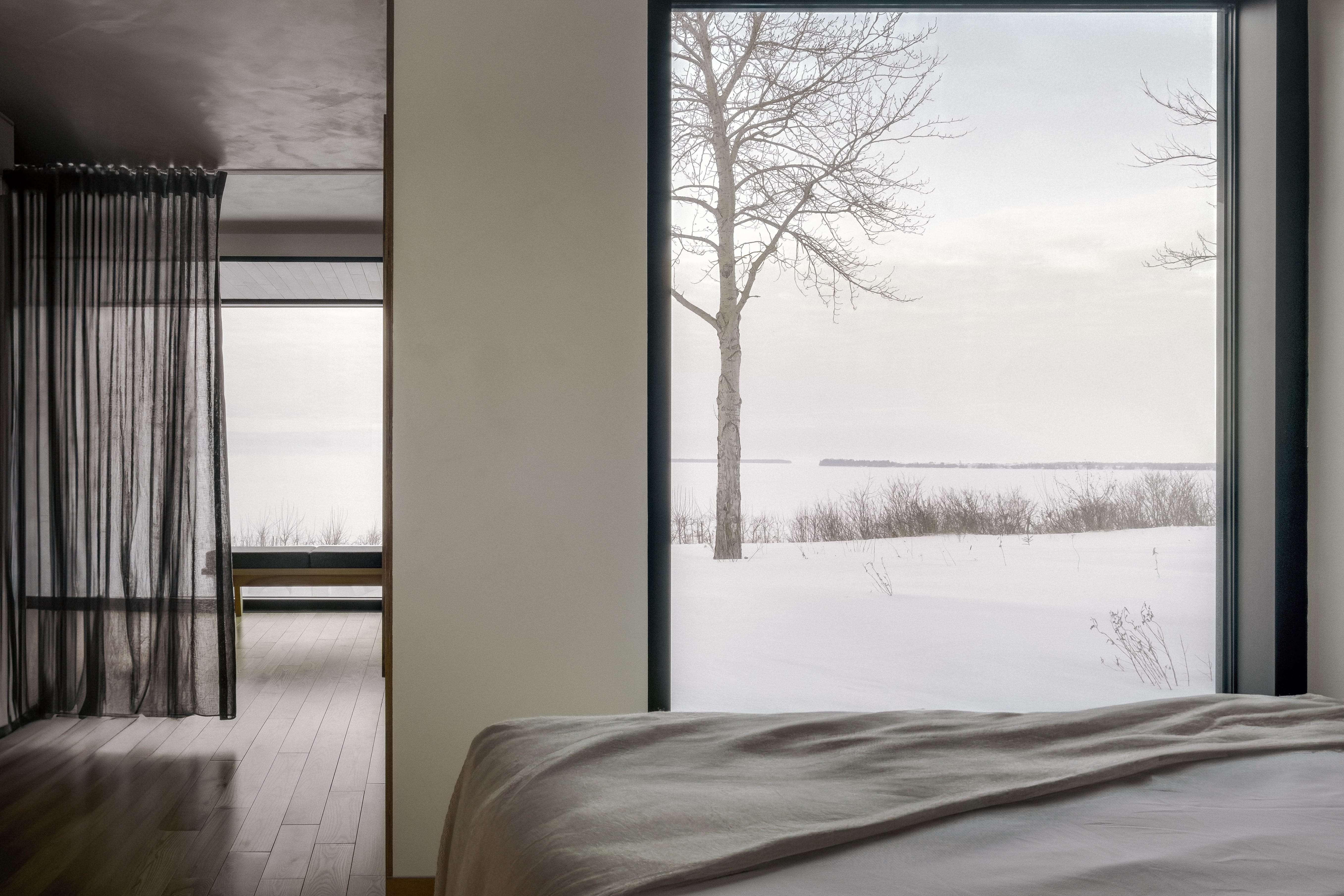 Delordinaire Architects designs a lakeside modular stilt house in ...
