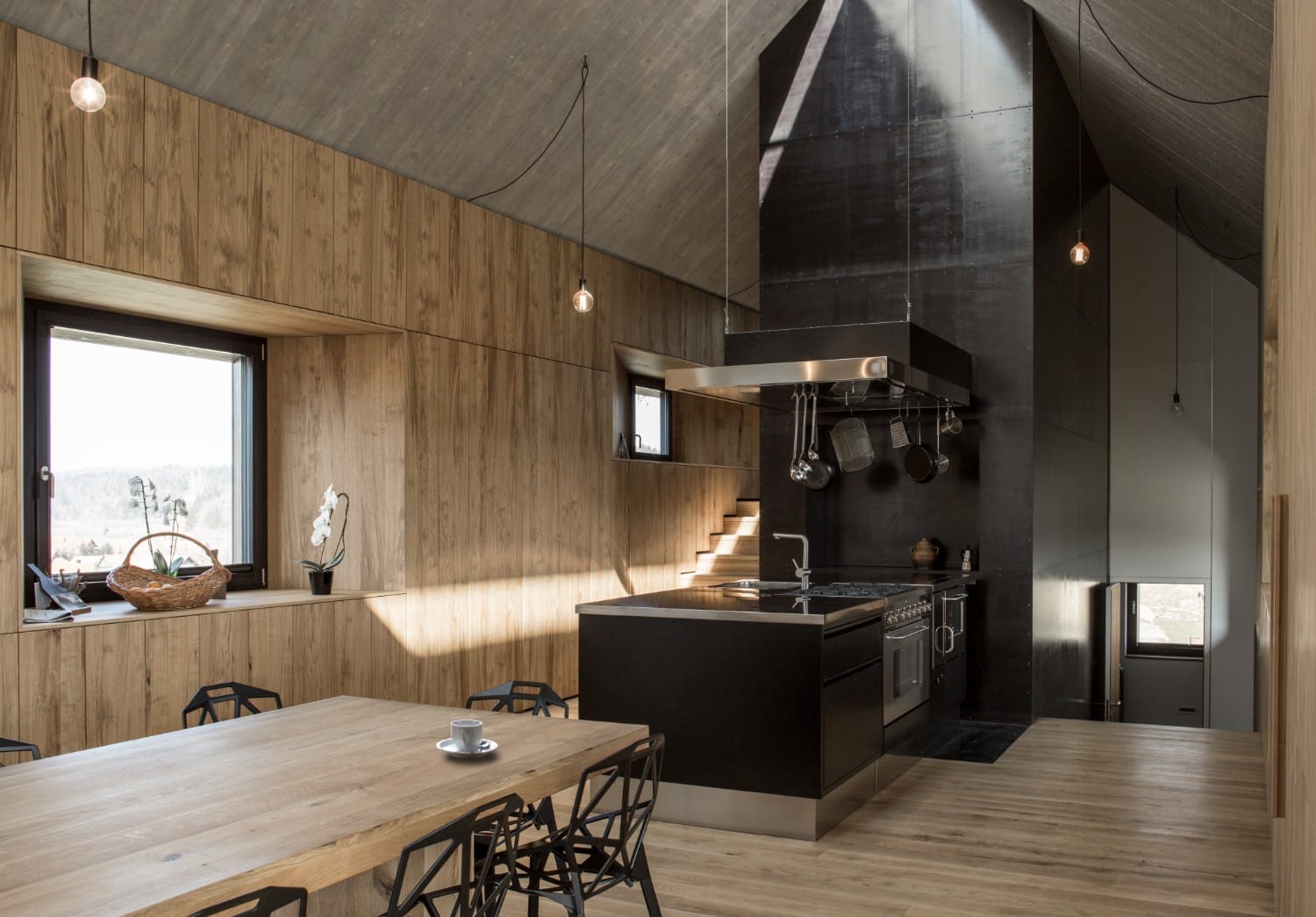 Between a 16th century church and a wooden barn: the Chimney House by ...