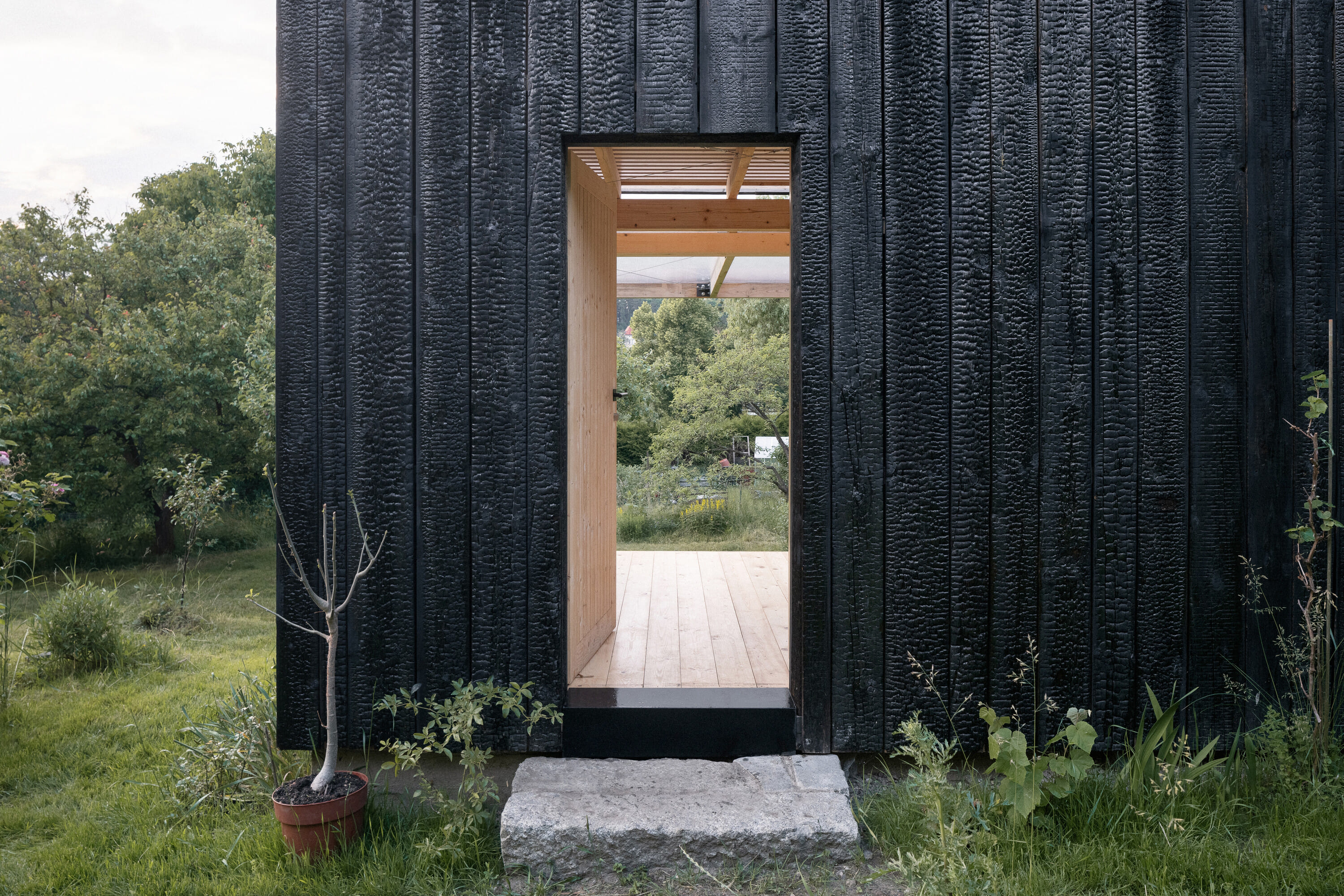Inside a Prague pavilion with a folding timber facade by BYRÓ ...