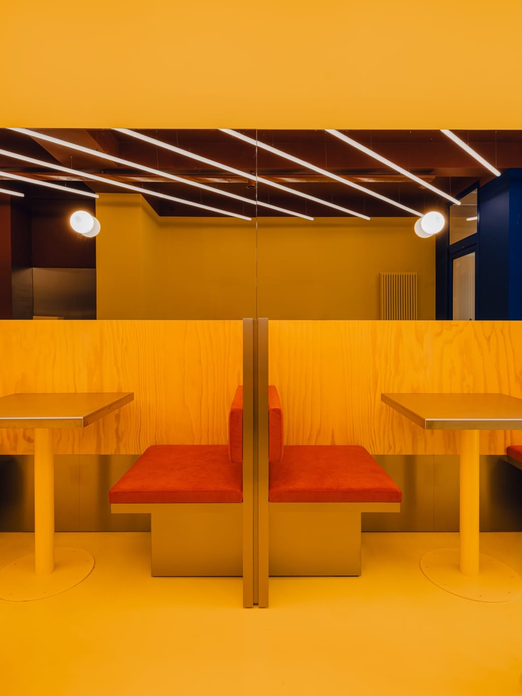 Inside a colorful Berlin burger restaurant with a ‘vibrant ...