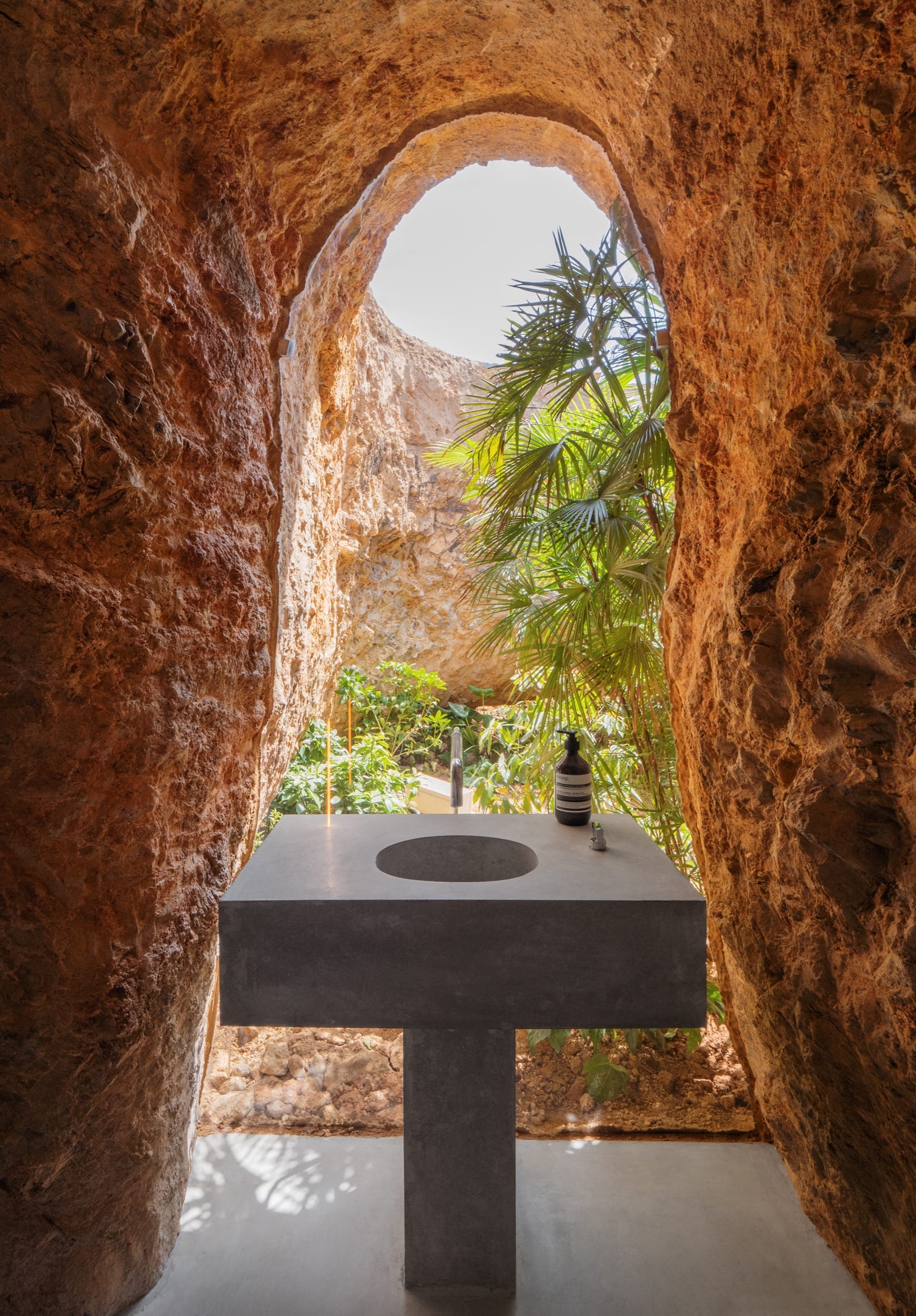 Junya Ishigami 'excavates' concrete cave for restaurant and residence ...