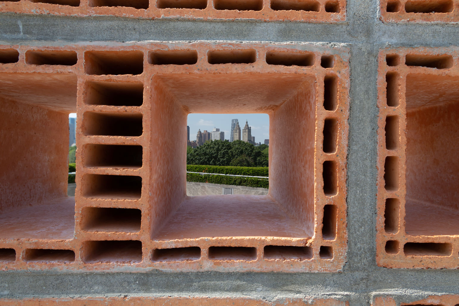 A terracotta block wall created by Mexican artist Héctor Zamora graces ...