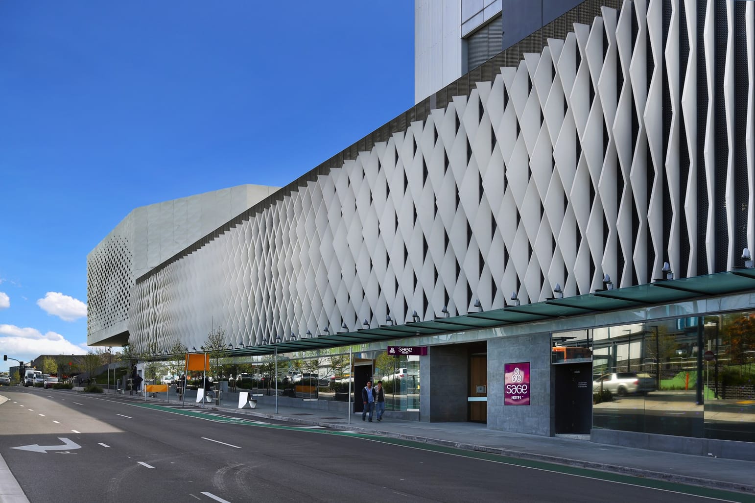 Draped in a fritted glass “curtain”, the Sage Hotel in Melbourne by ...