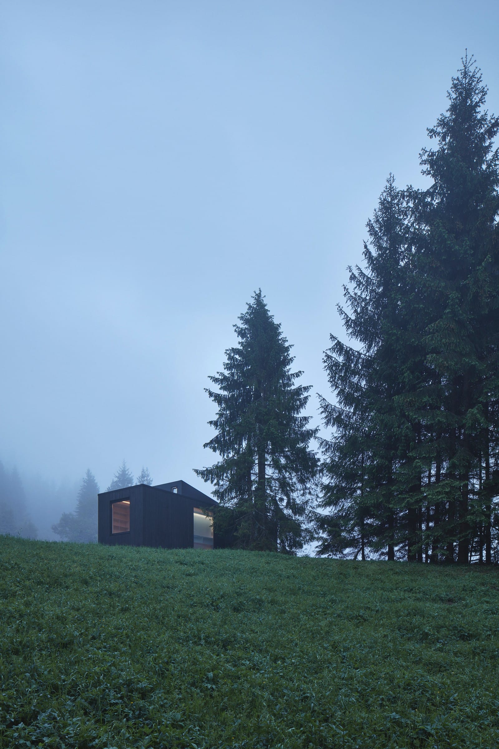 This 40m2 wilderness cabin by Ark Shelter Studio offers a cozy glamping ...