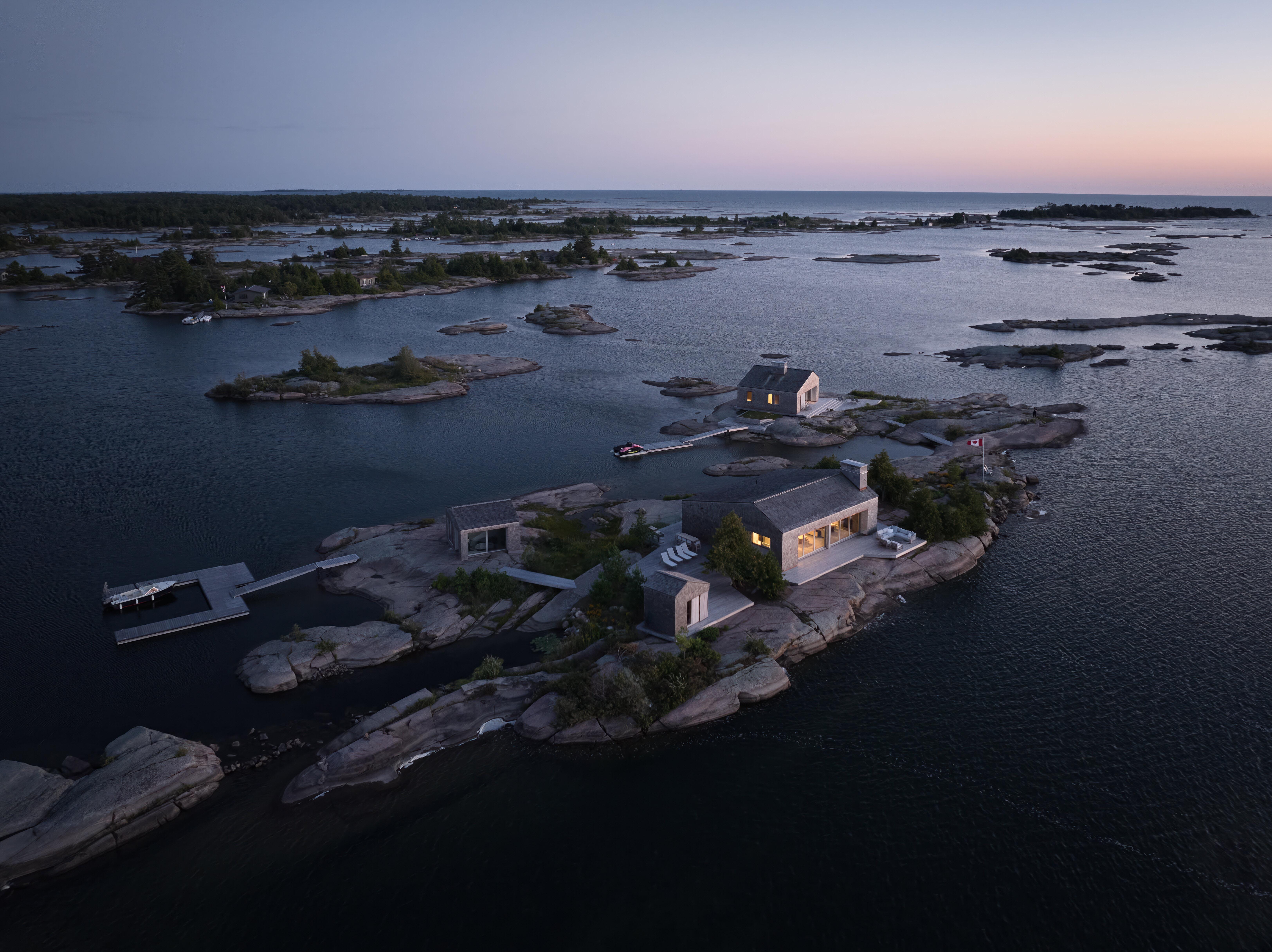 Modern summer home by Akb emerges from cluster of scattered islands in ...