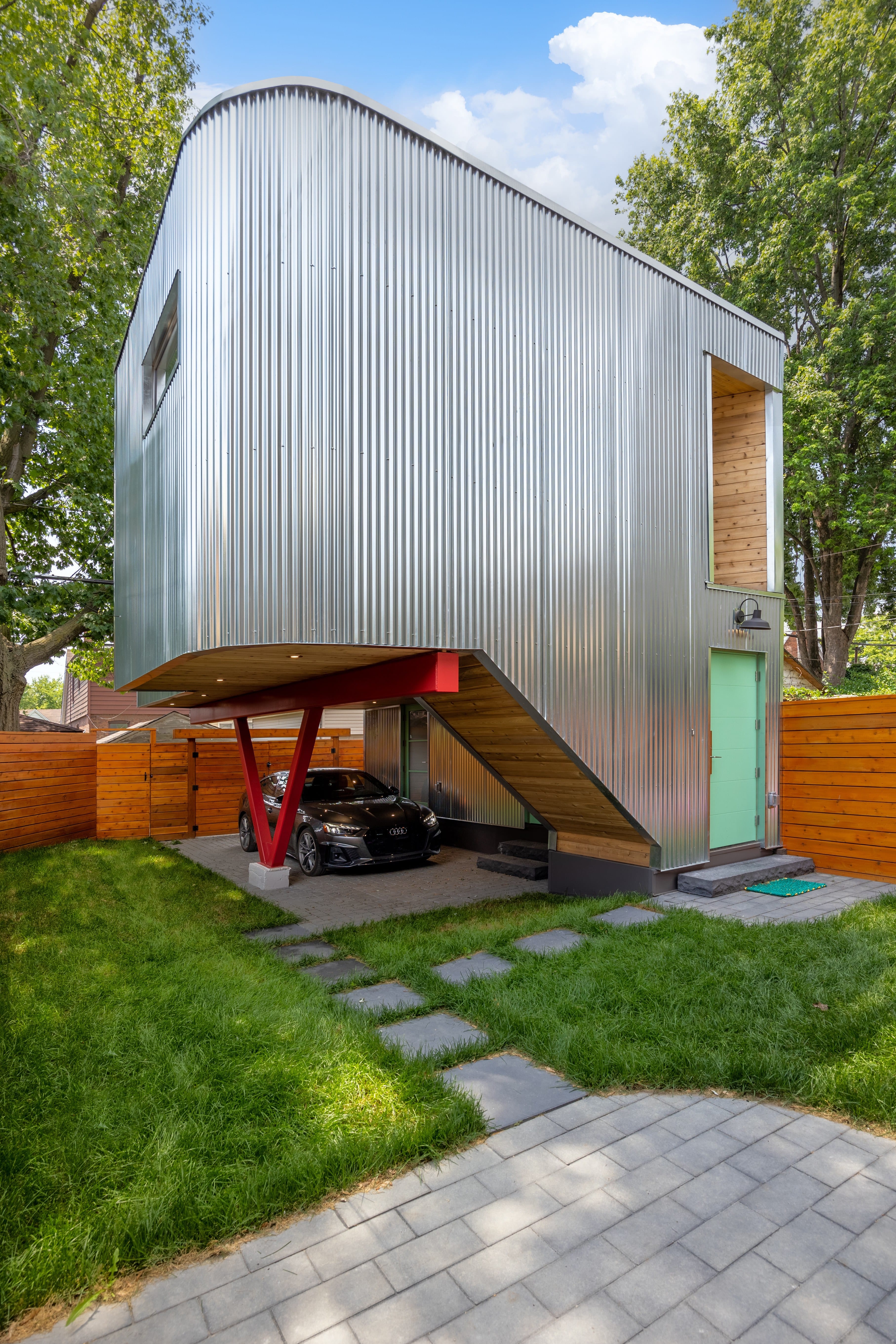 This Toronto ADU design is mindful of neighboring mapple tree roots ...