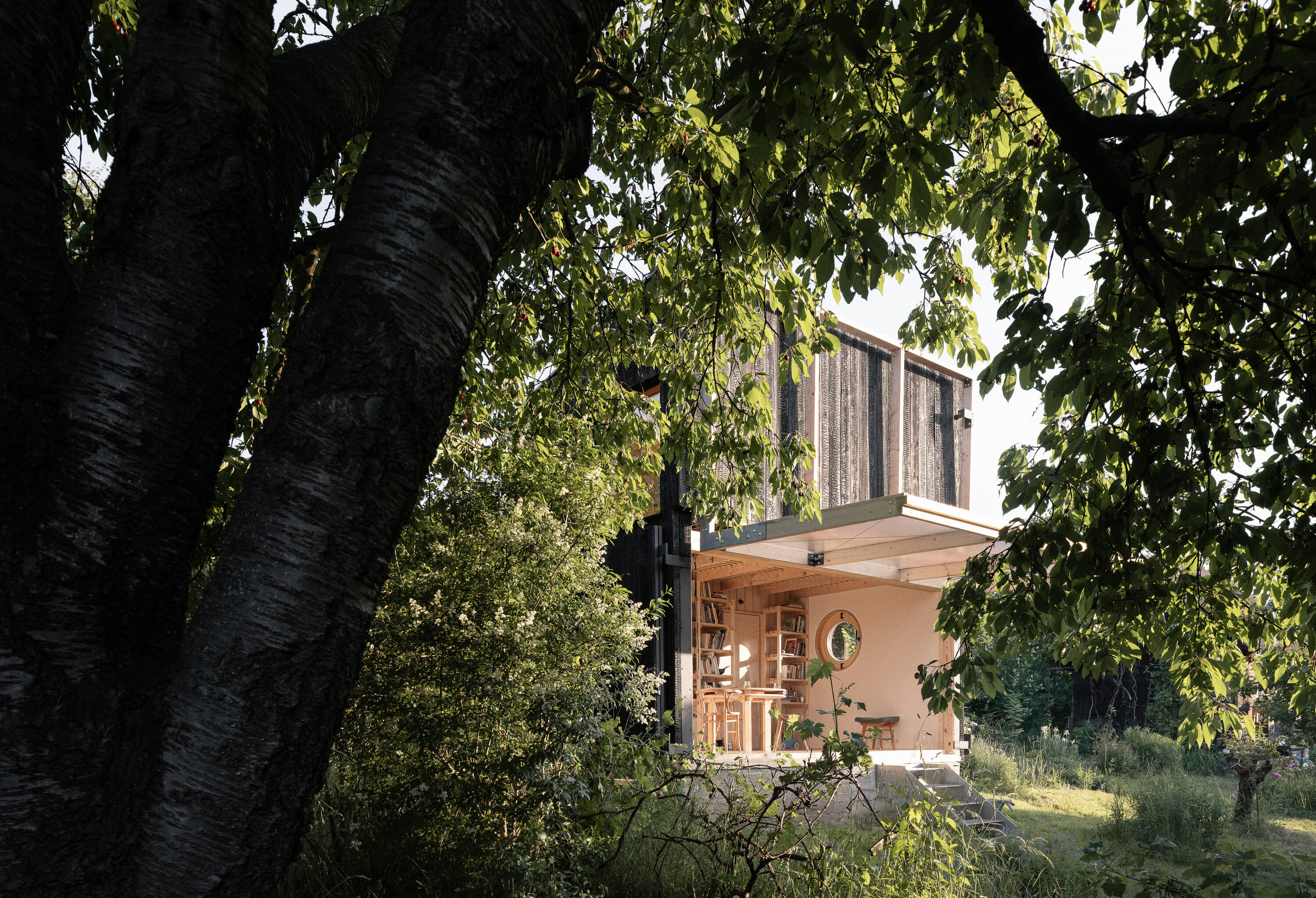 Inside a Prague pavilion with a folding timber facade by BYRÓ ...
