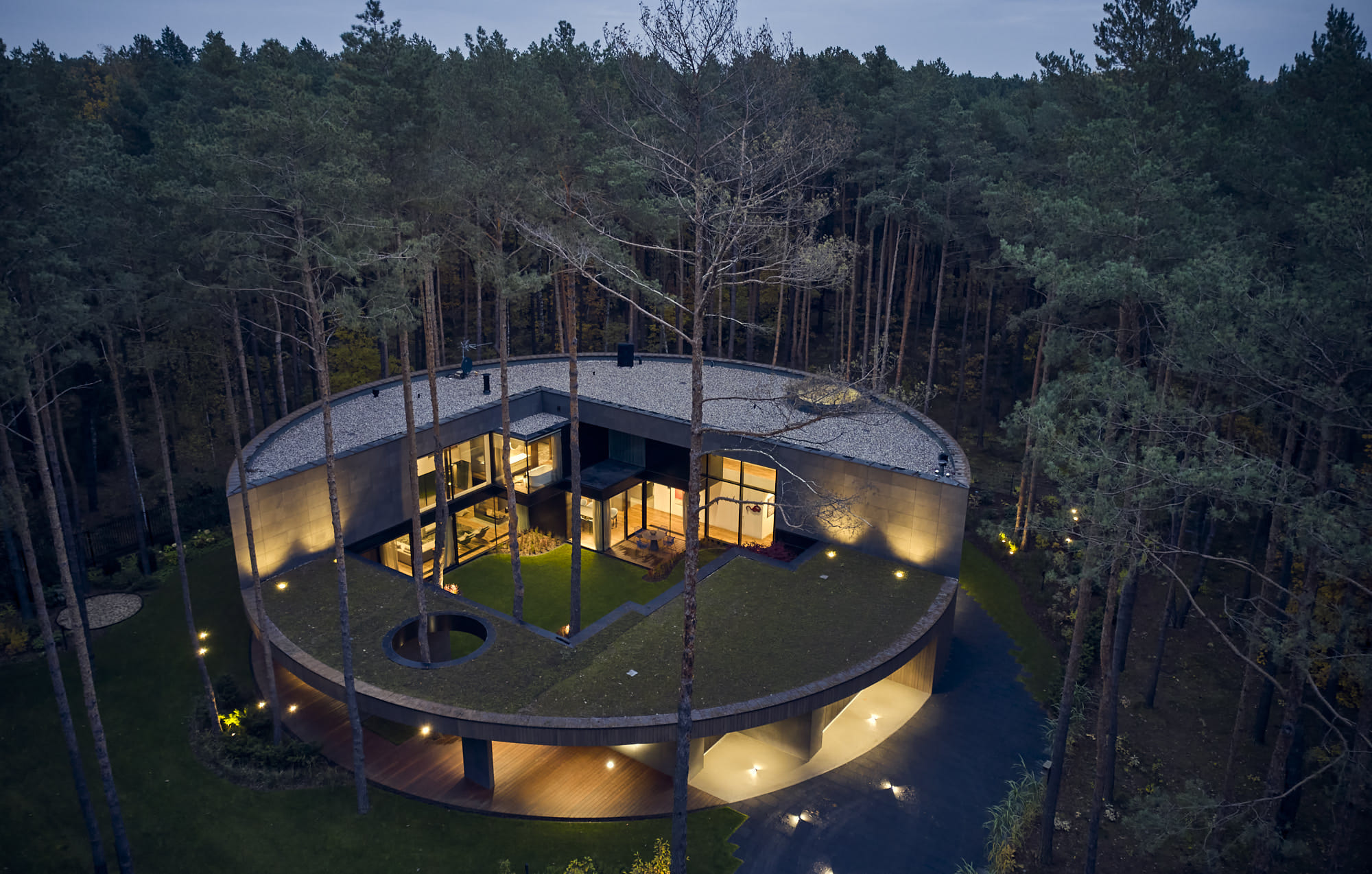In a Polish forest, Mobius Architekci Studio creates a timber-clad home ...