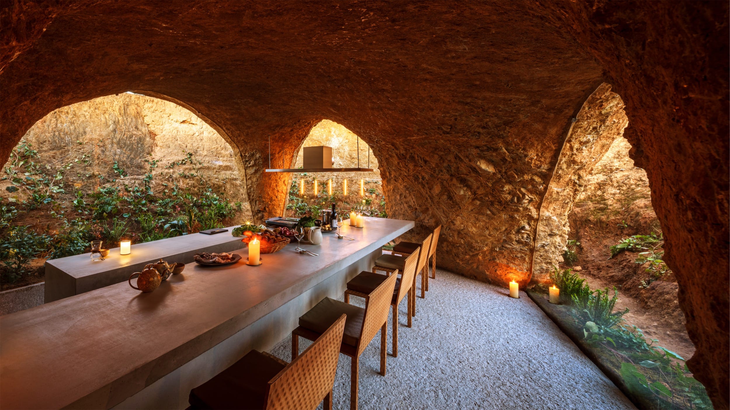 Junya Ishigami 'excavates' concrete cave for restaurant and residence ...