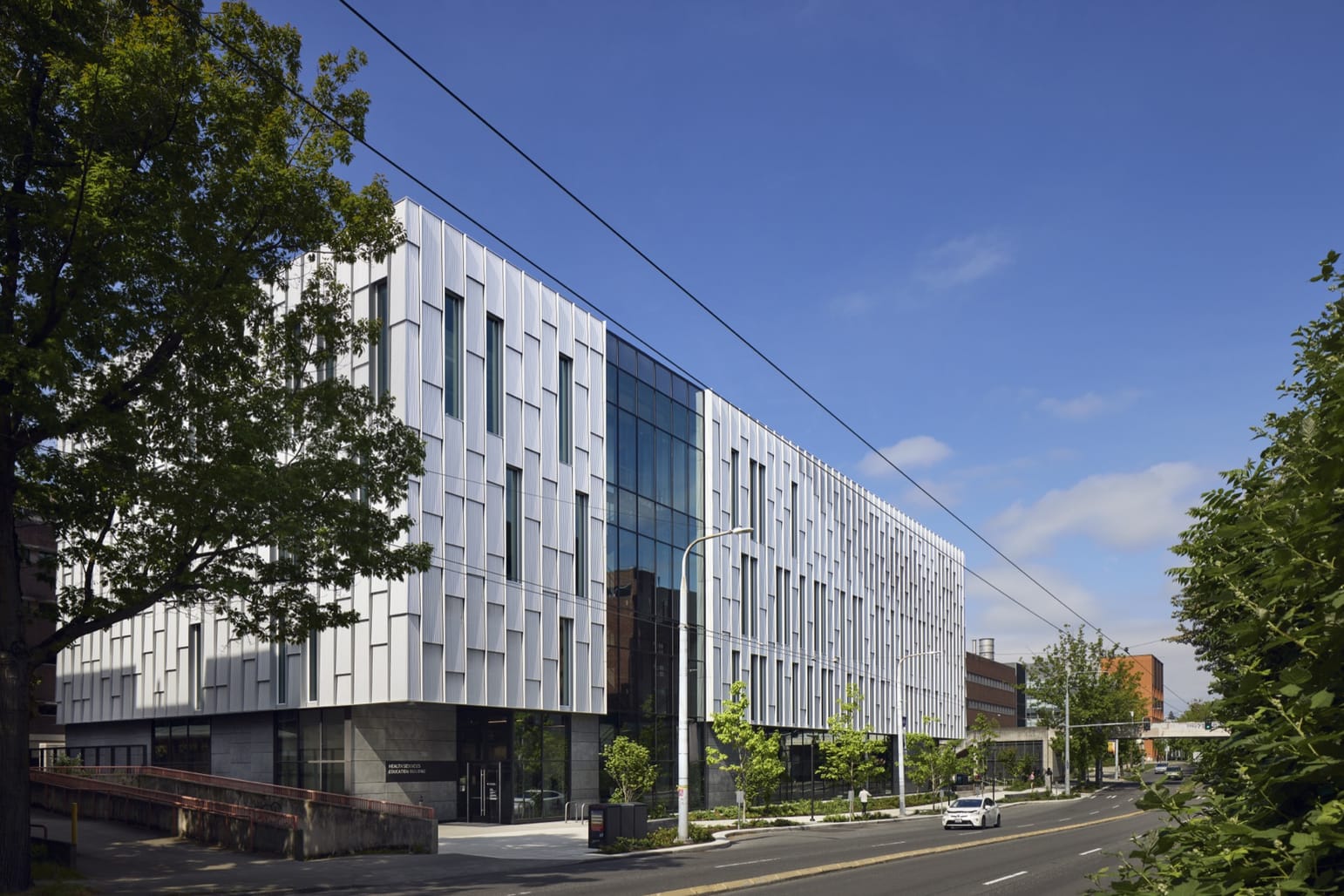 A ‘textural and reflective building skin’ wraps the University of ...