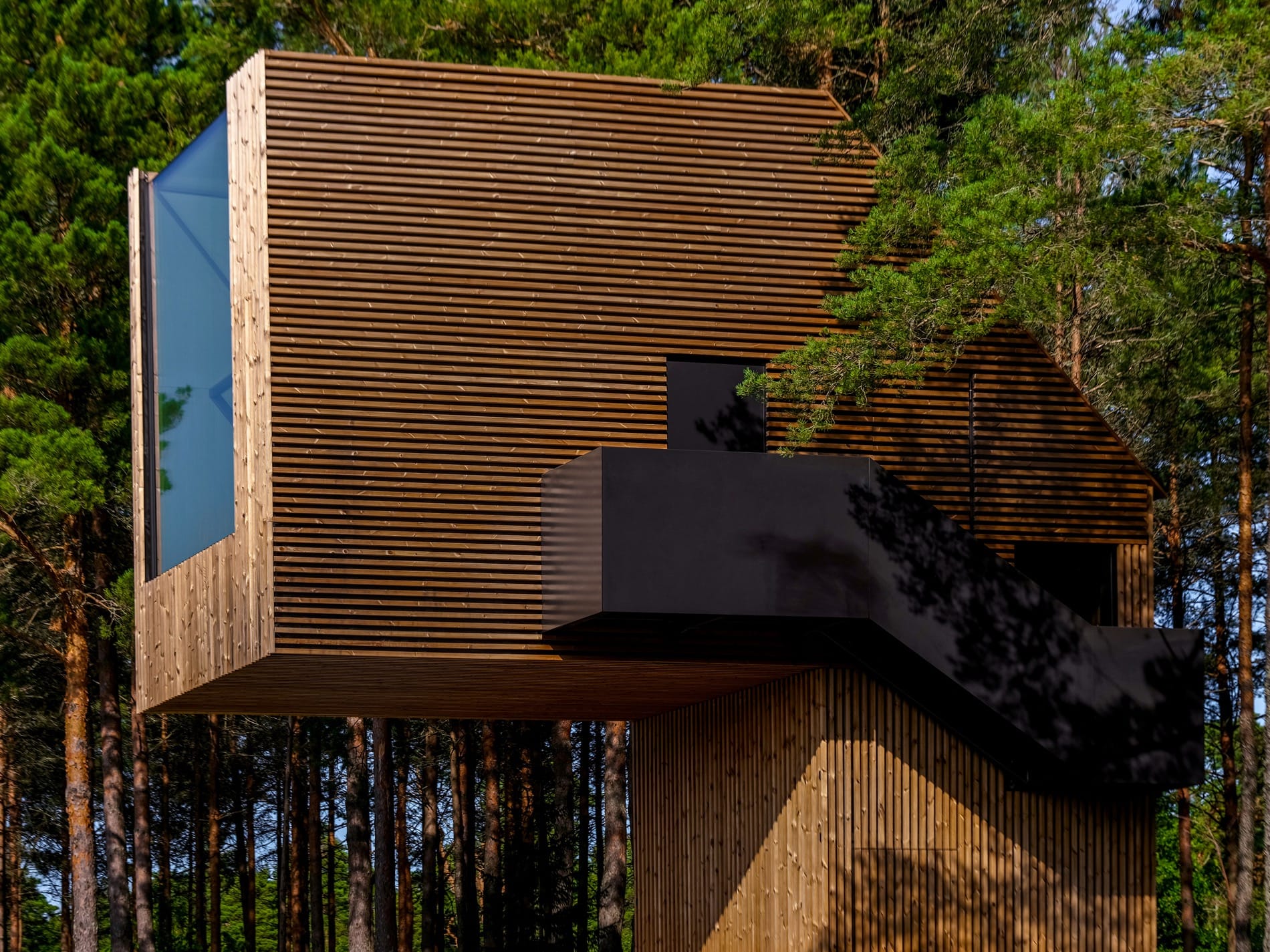 This cantilevering modular treehouse peeks into the Estonian wilderness ...