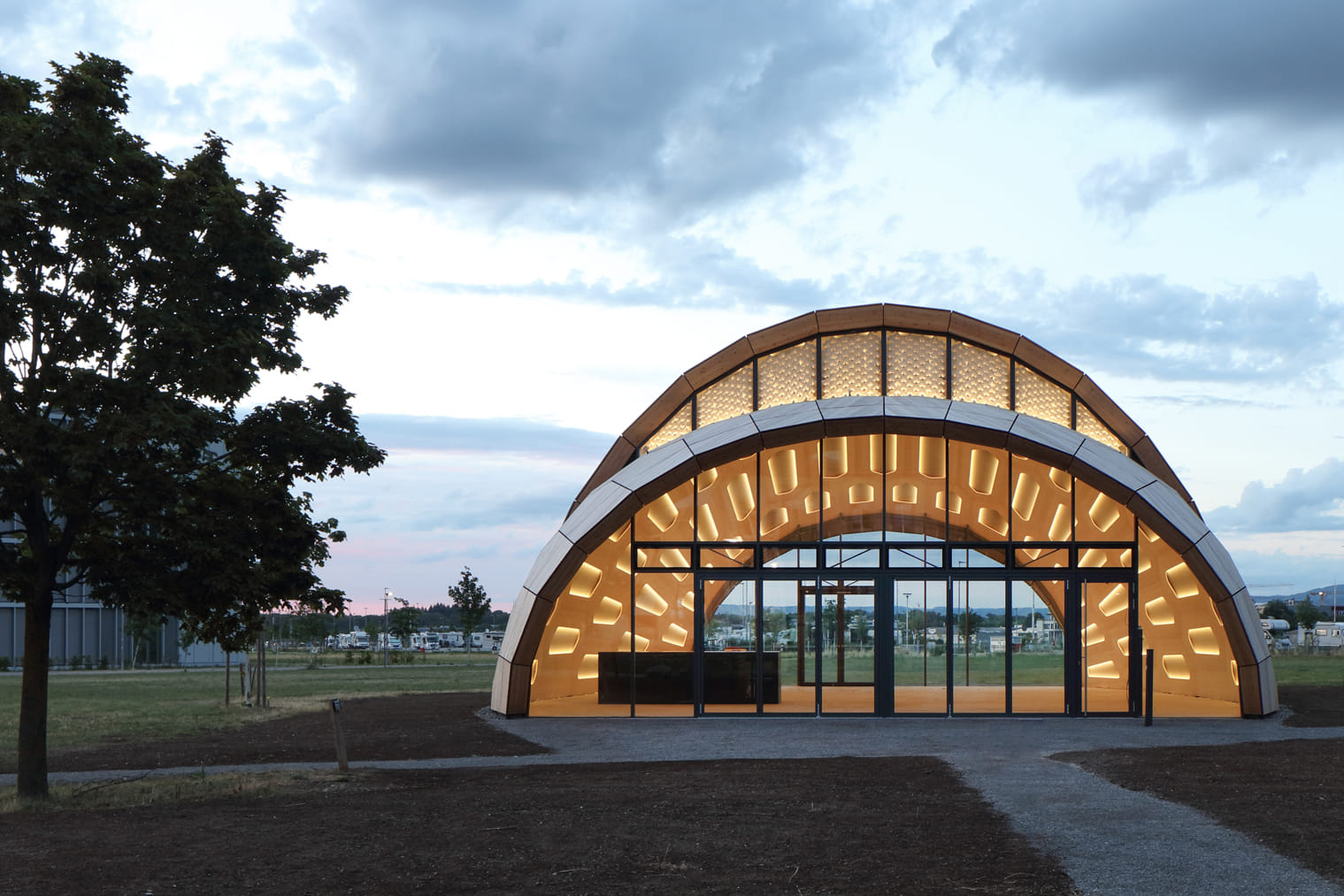 Robots assemble a domed timber pavilion designed by the universities of ...
