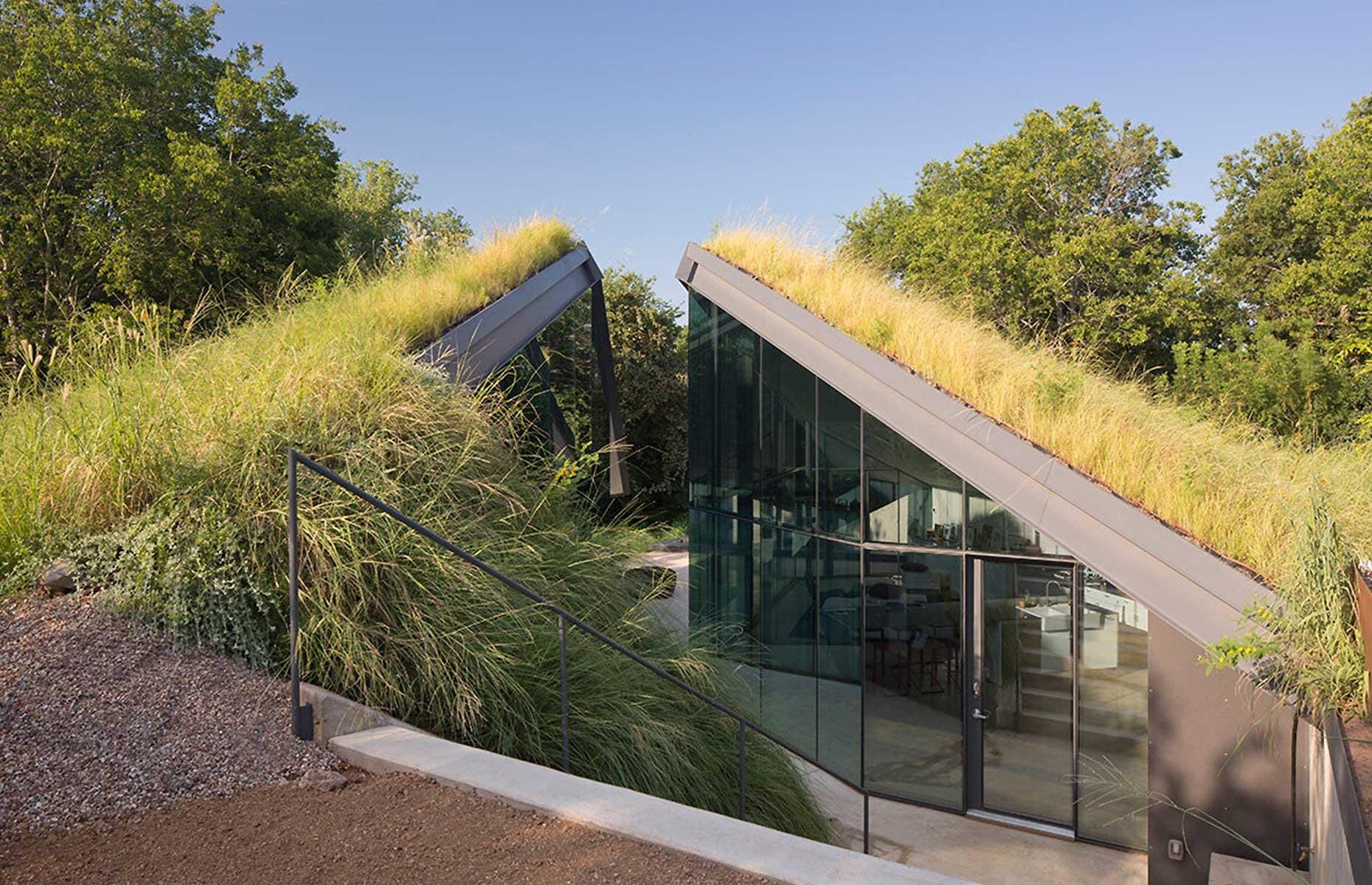 A split structure made of poured concrete, steel beams, and wood | News ...