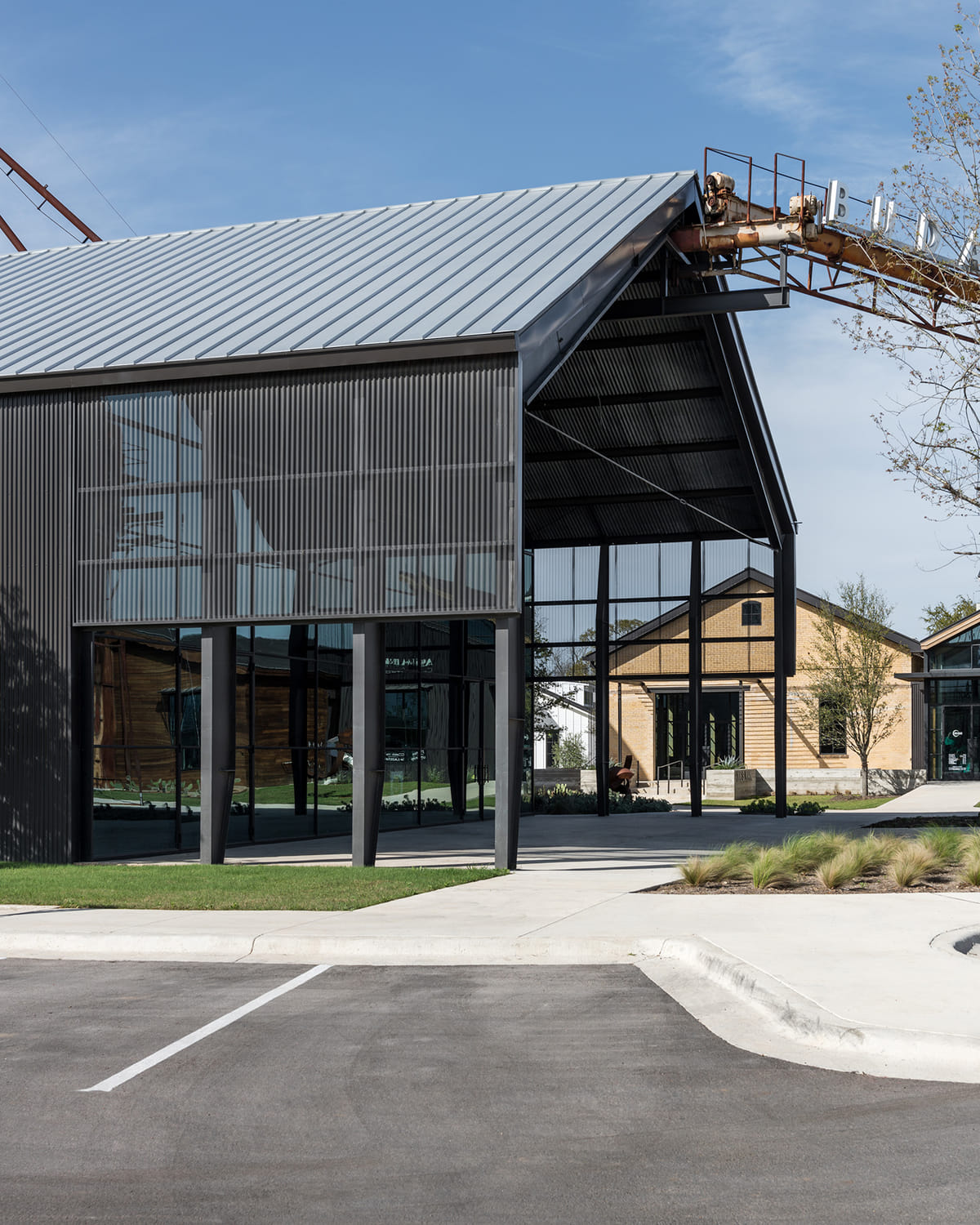 Buda Mill & Grain Co. | Cushing Terrell | Archinect