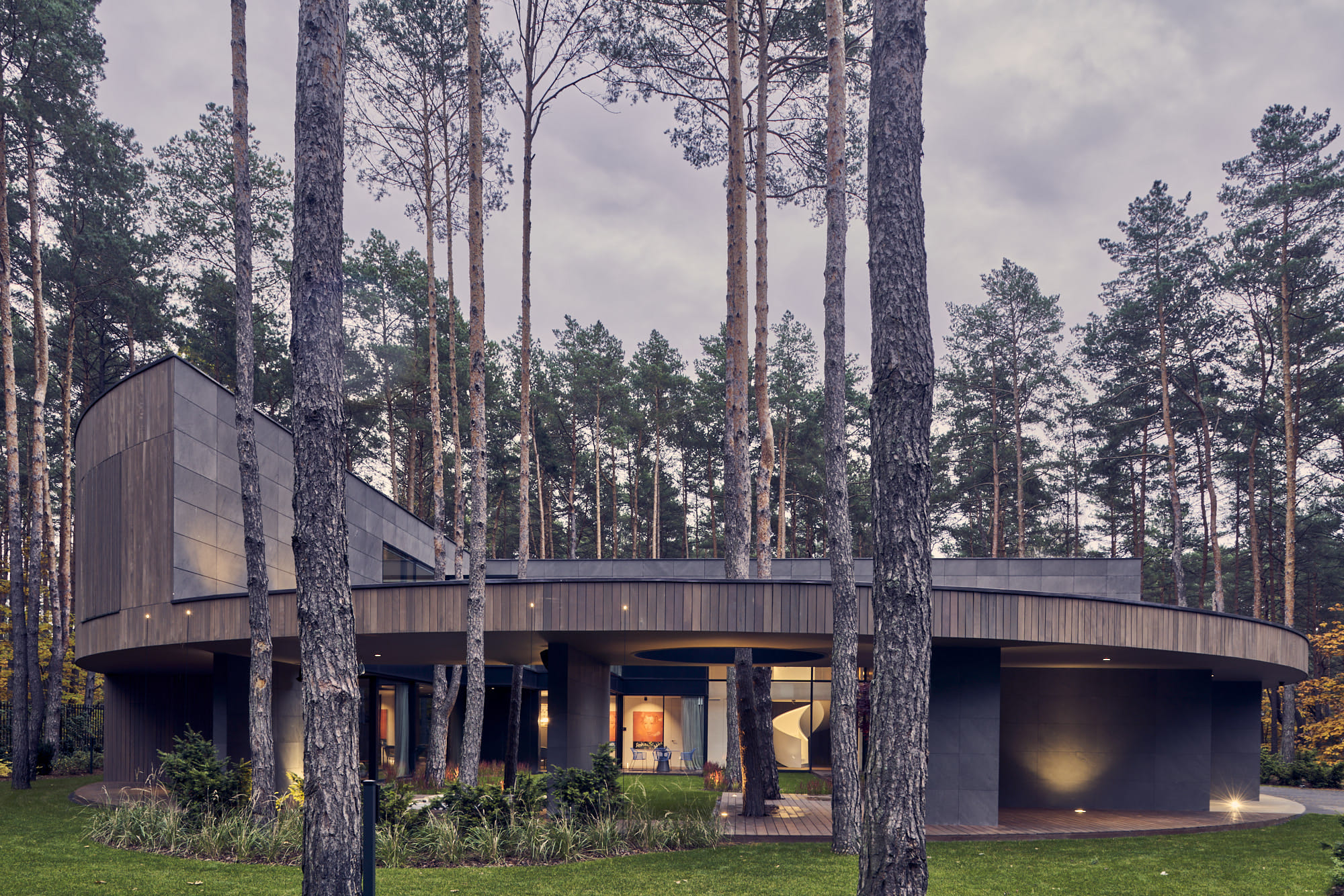 In a Polish forest, Mobius Architekci Studio creates a timber-clad home ...