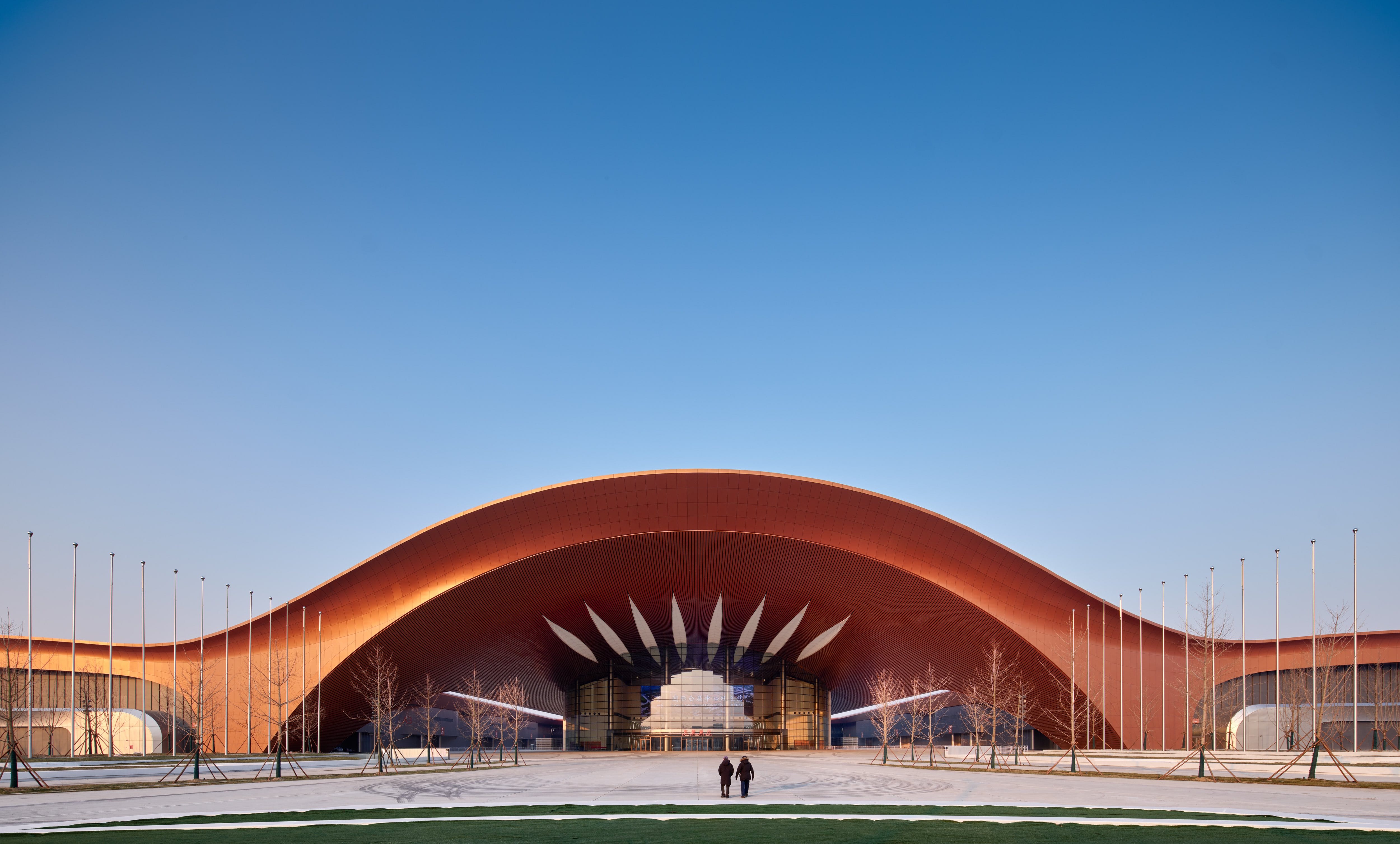 Copper-toned, sinuous exhibition center by Zaha Hadid Architects opens in Beijing | News | Archinect