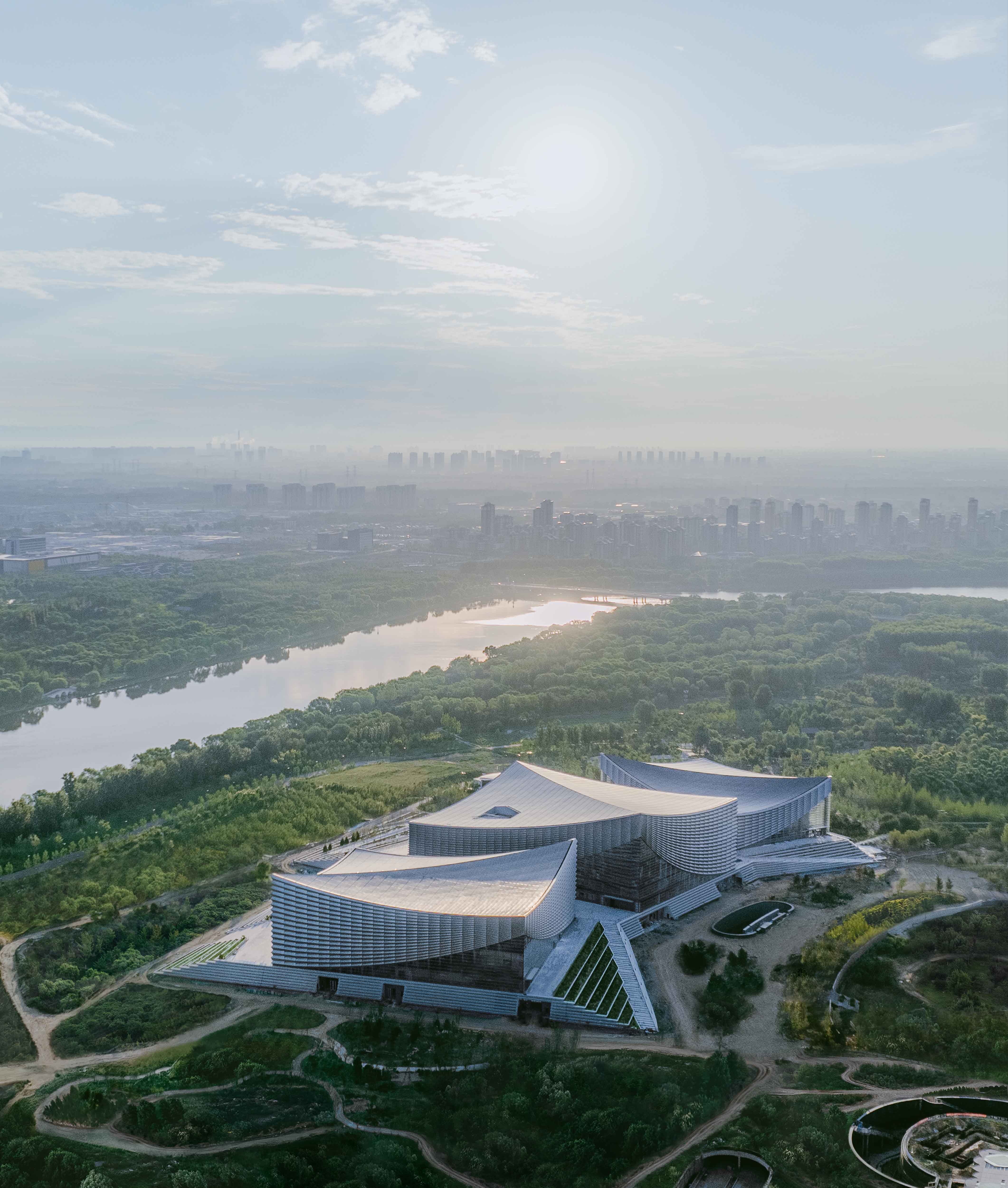New Beijing Performing Arts Center rises from its historic waterside ...