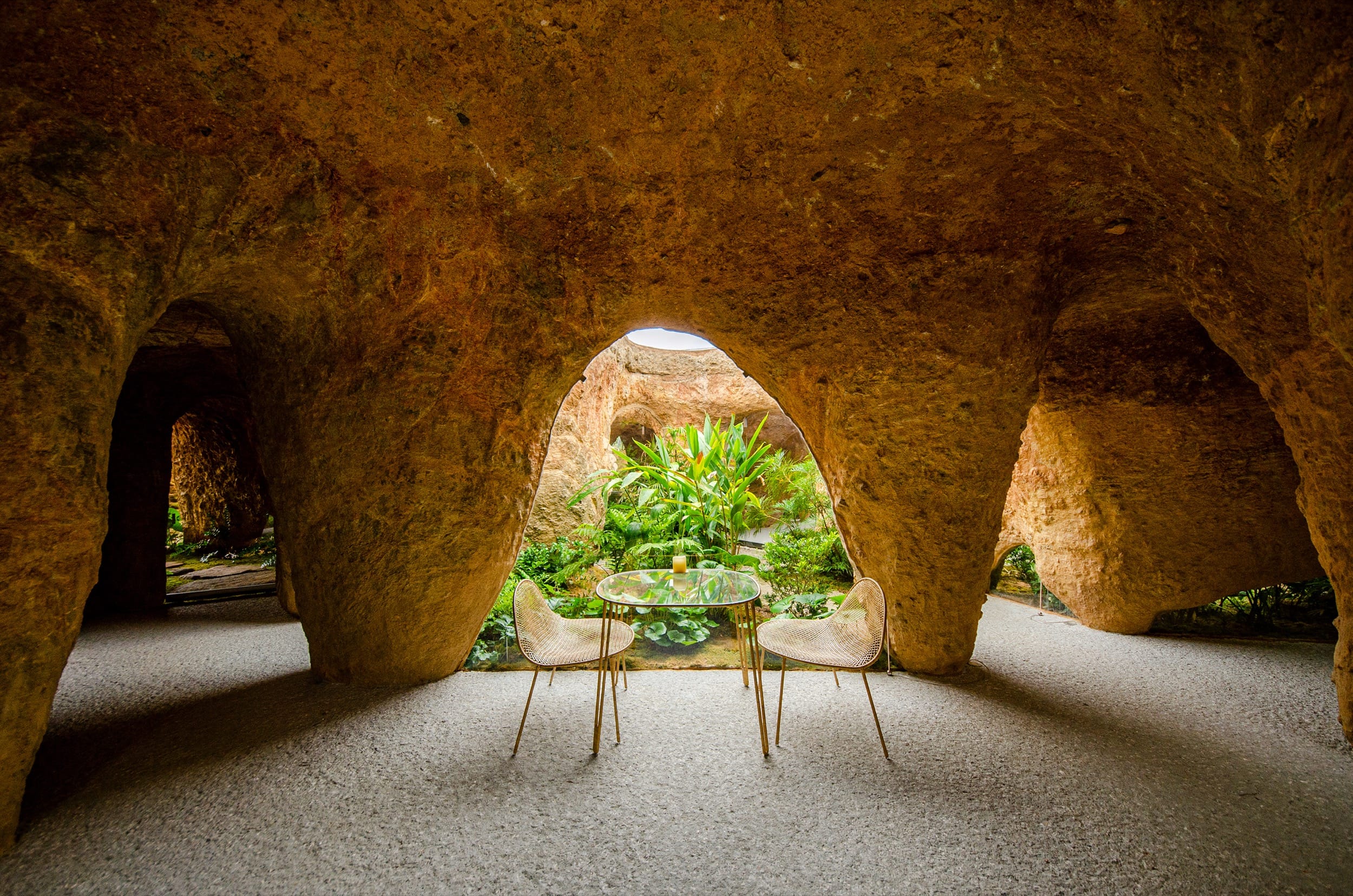 Junya Ishigami 'excavates' concrete cave for restaurant and residence ...