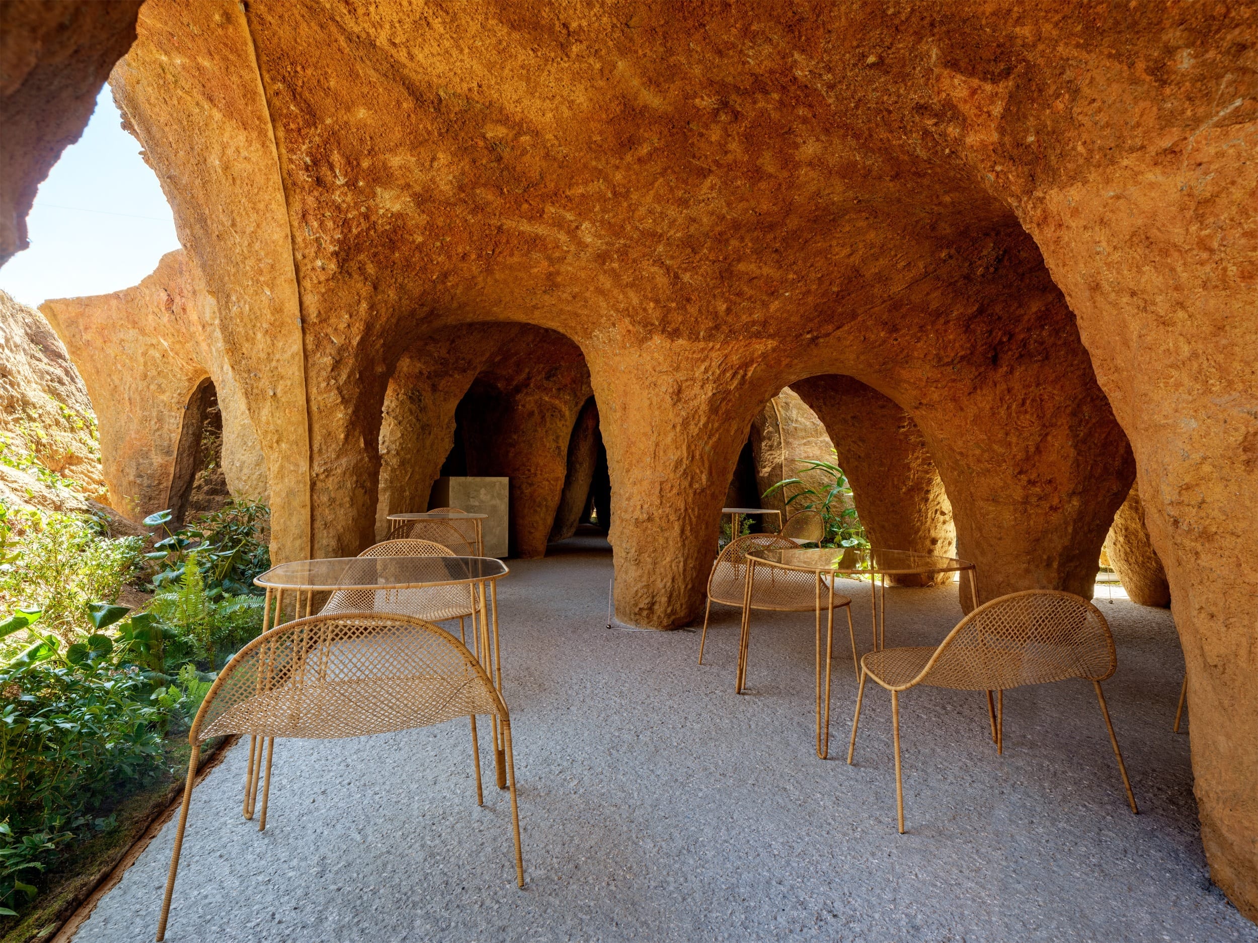 Junya Ishigami 'excavates' concrete cave for restaurant and residence ...