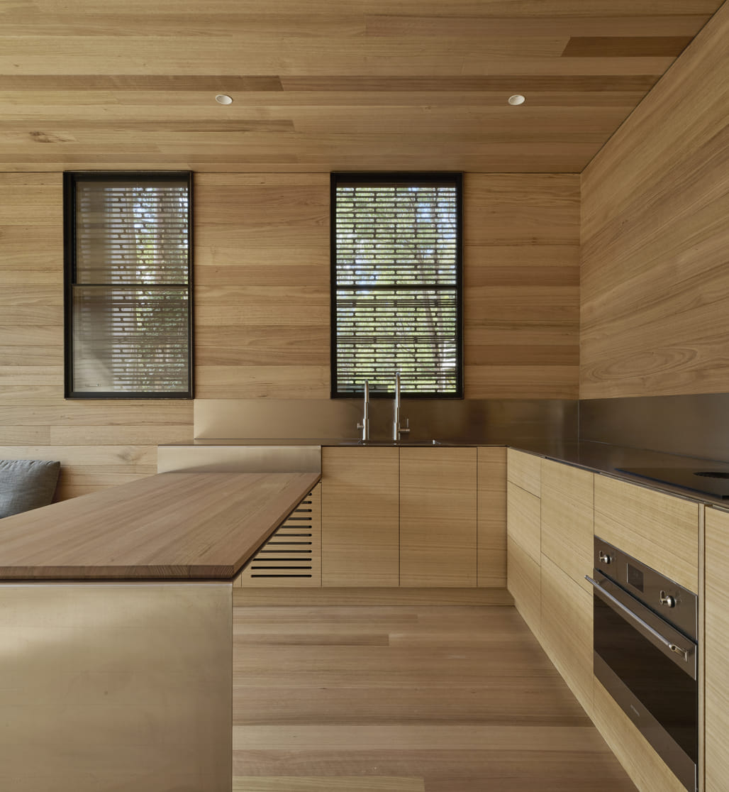 Robbie Walker's Sawmill Treehouse blends into the trees through its ...