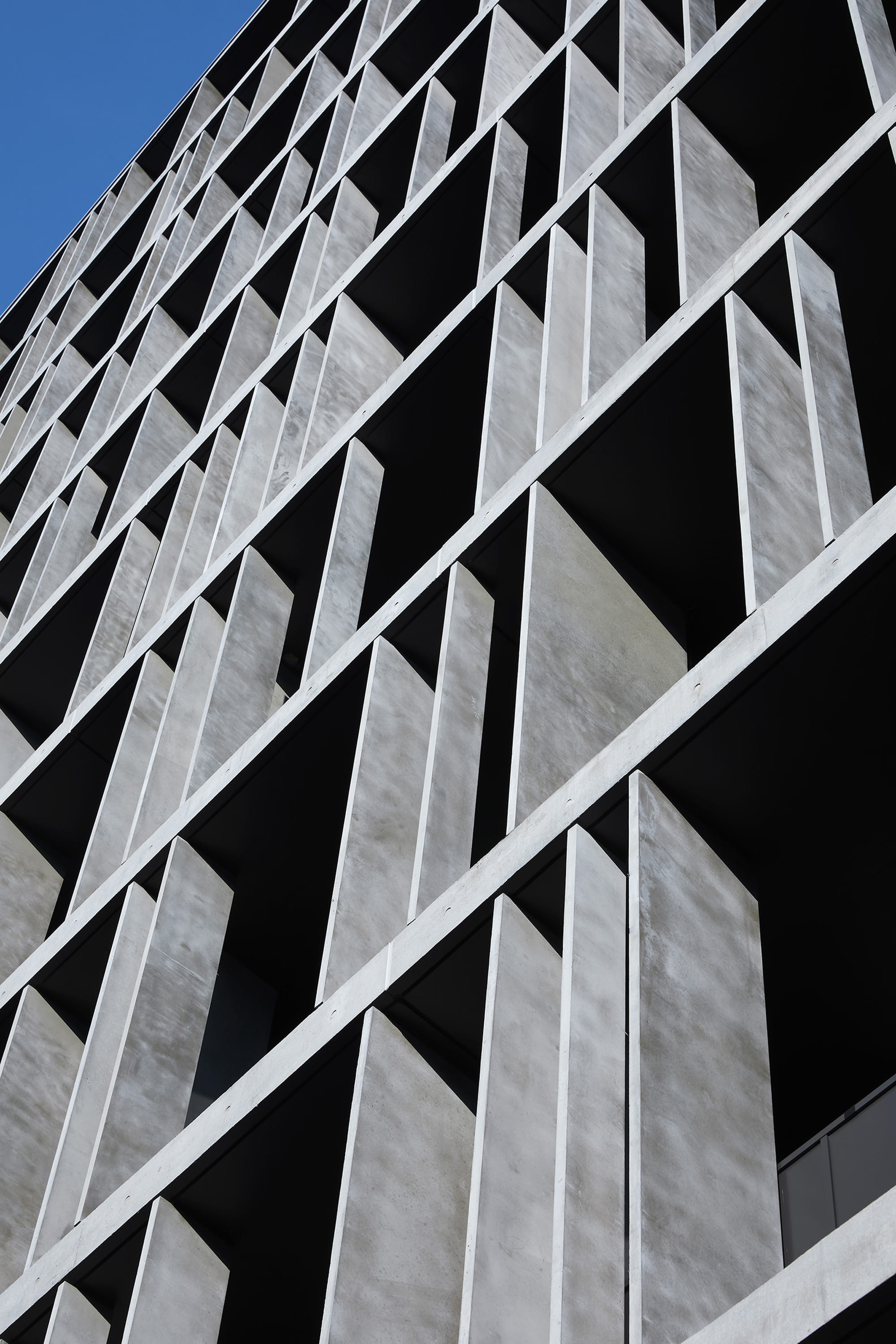 Kannai Blade Residence with paper thin concrete panels | Akira Koyama ...