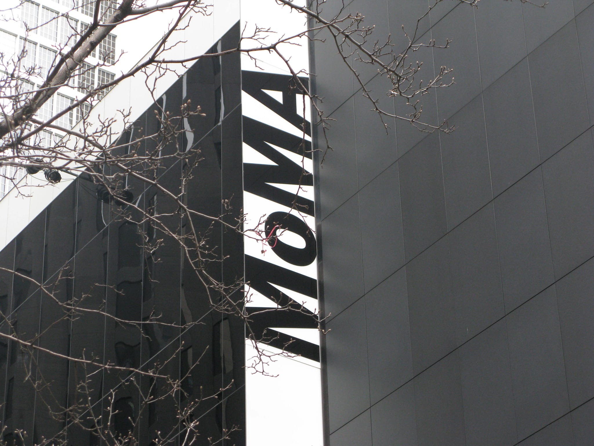 MoMA agrees to temporarily cover Philip Johnson's name with Black ...