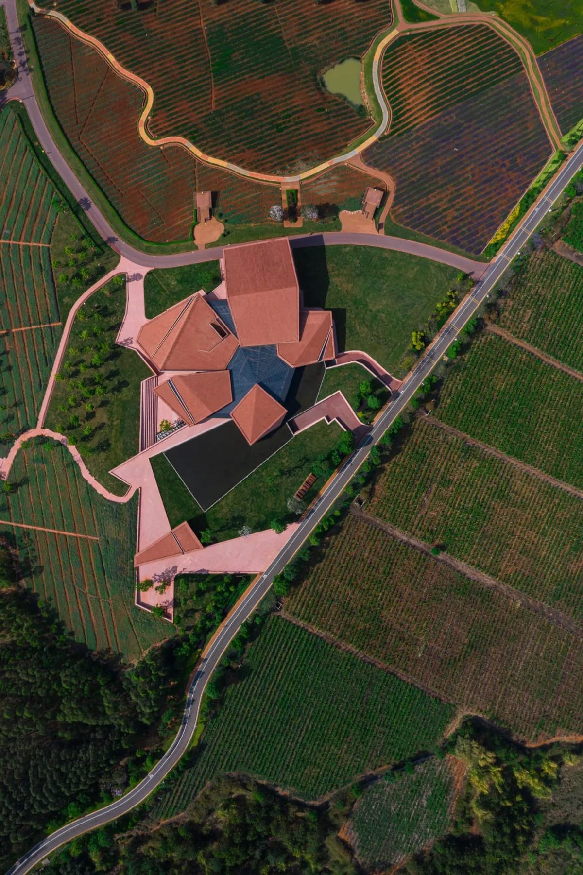 Red Stone Formation, Yunnan Dongfengyun Art Center | line+ | Archinect