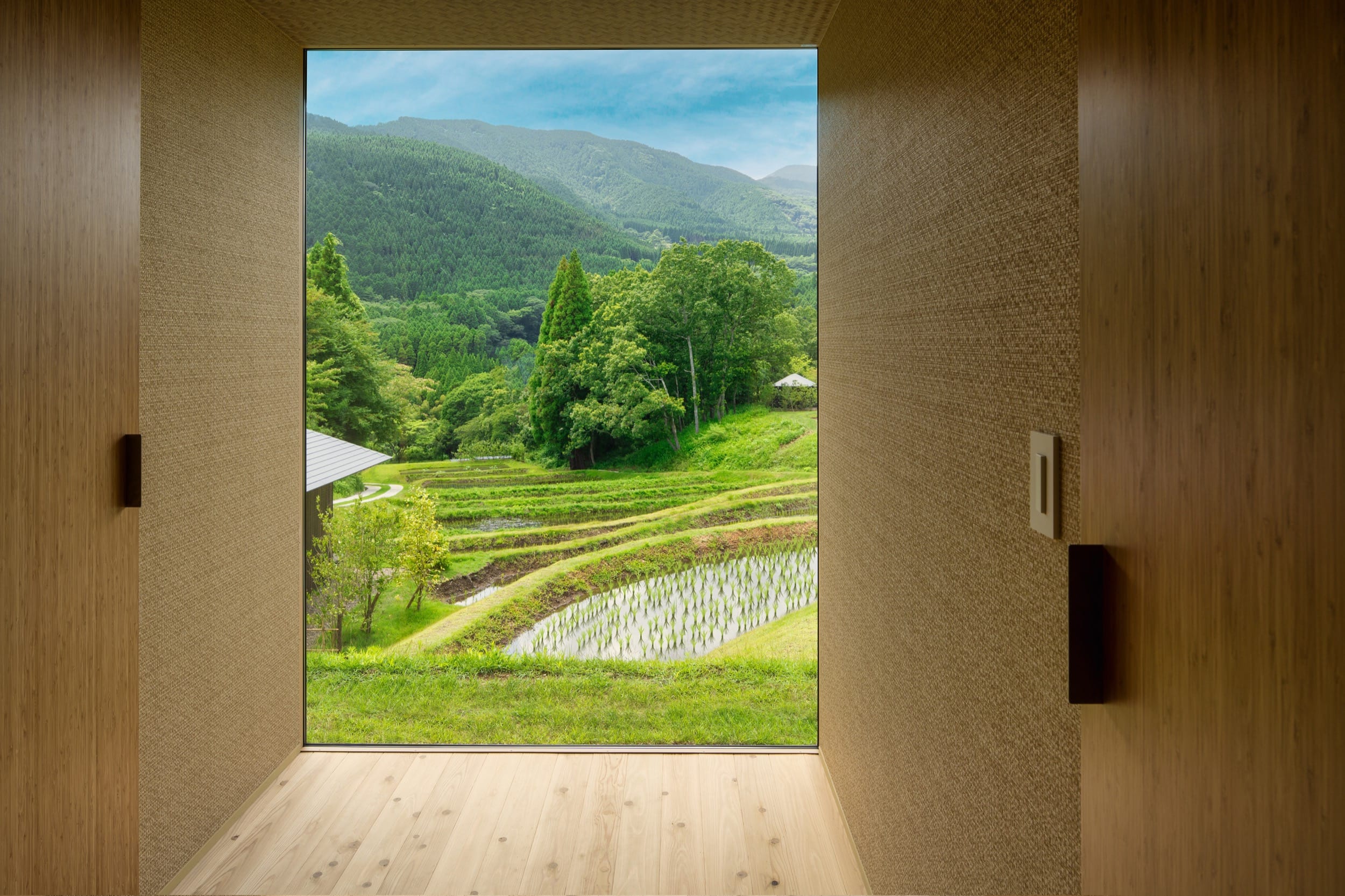 Kengo Kuma completes Japanese farmhouse resort surrounding rice ...