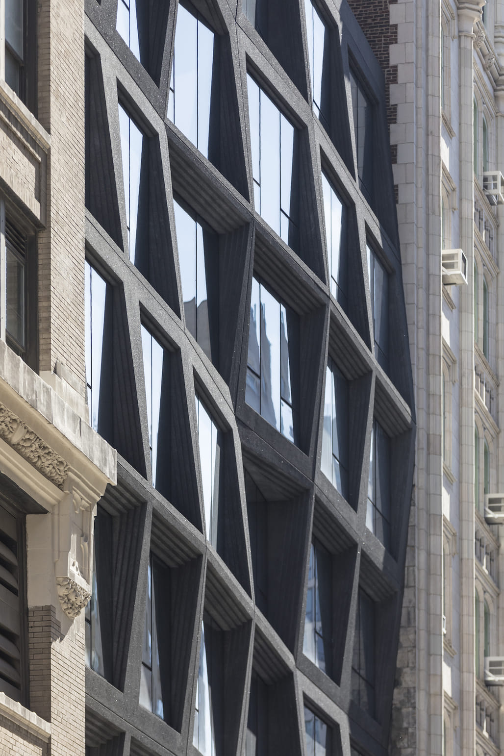 See new views of OMA’s first NYC building, with 'prismatic' details ...