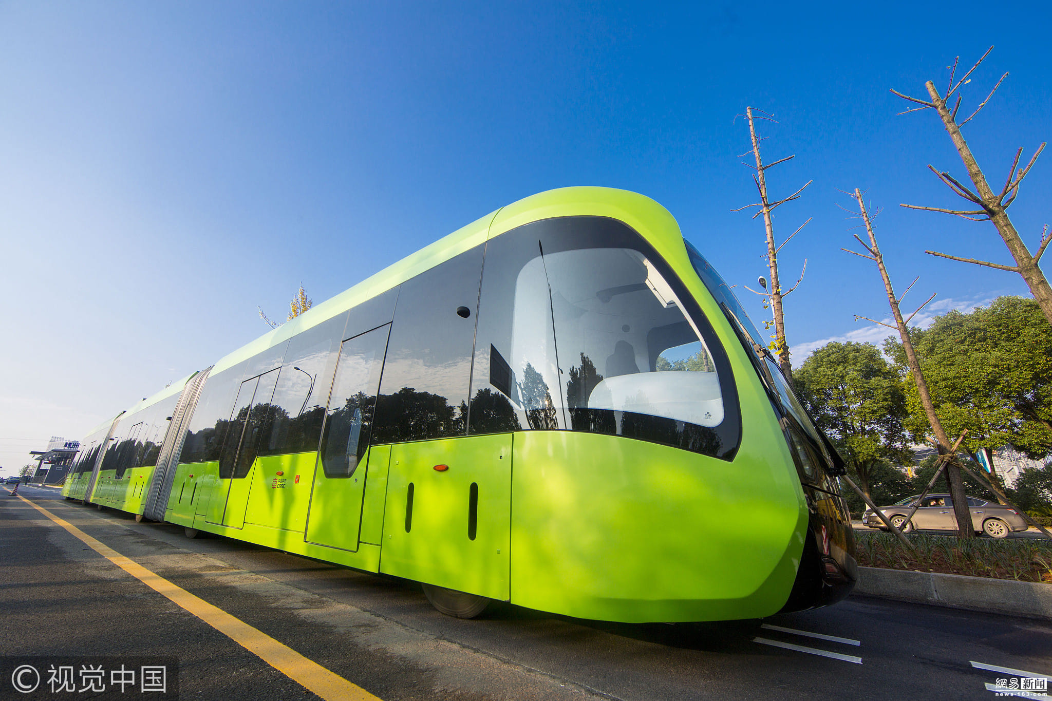 China tests driverless bus guided by sensor tracks in the road | News ...