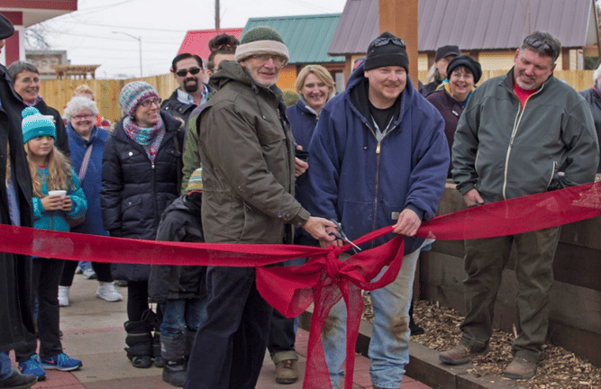 Tiny house village built with and for the homeless opens in Wisconsin ...
