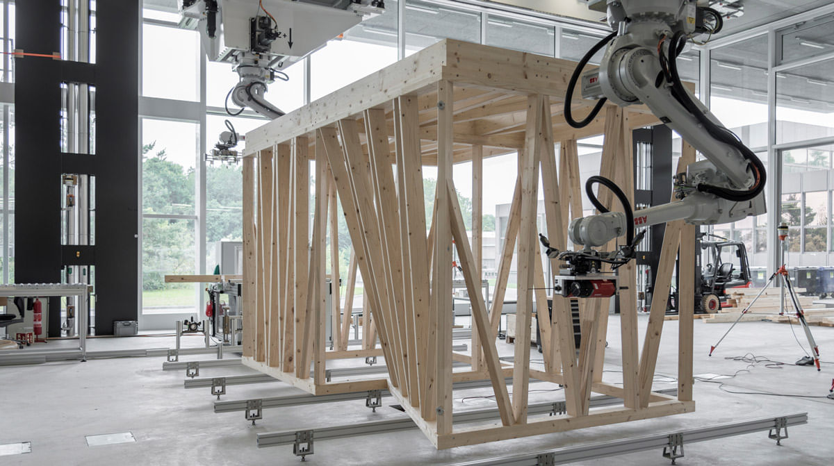 Watch these robots build a timber house structure in Switzerland | News ...